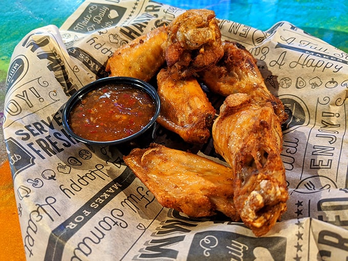 These wings aren't just smoked—they've had a full spa treatment of flavor. Crispy, golden-brown therapy served with dipping sauce on the side.