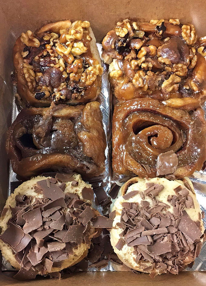 Behold the sticky bun motherlode! These glistening, walnut-studded beauties aren't just breakfast – they're an experience worth planning your day around.