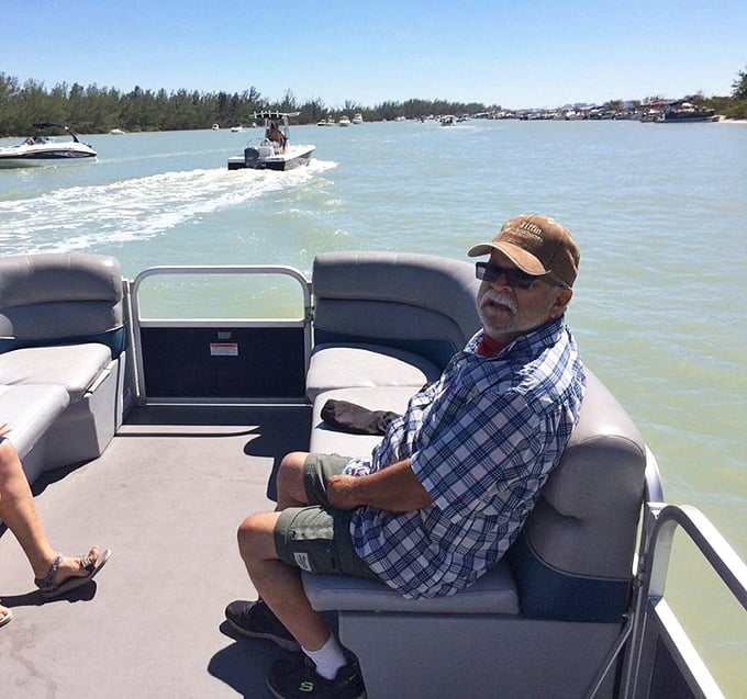 The captain's life: navigating the calm waters surrounding Keewaydin. No traffic jams, no honking horns—just the gentle hum of an outboard and endless blue horizons.