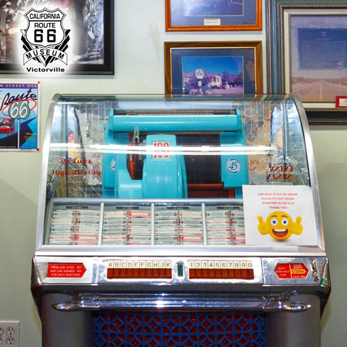 This turquoise jukebox doesn't just play tunes—it plays memories. One quarter and suddenly you're in a 1950s diner ordering a chocolate malt.