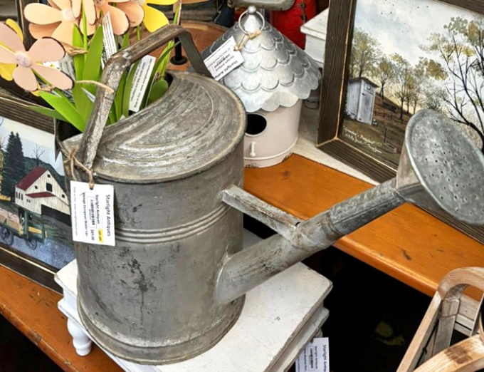 This isn't just a watering can—it's a time machine to Grandpa's garden, complete with the patina that only decades of faithful service can create.