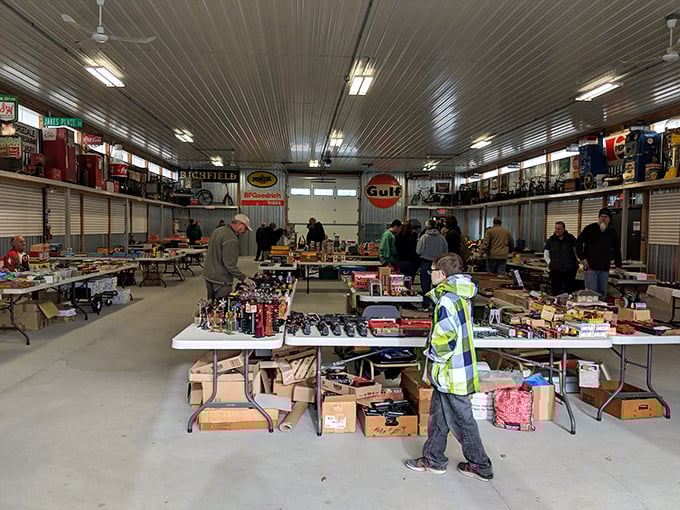 The indoor section offers climate-controlled antiquing—where serious collectors gather like archaeologists at a particularly promising dig site.