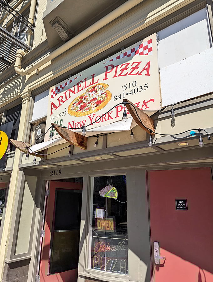 Arinell's vintage sign has guided Berkeley pizza seekers for decades. No frills, no fuss, just perfectly foldable New York-style slices.