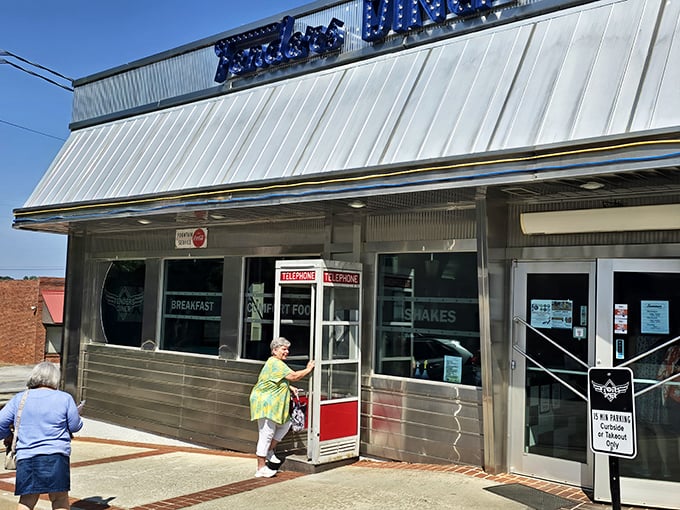 Classic white diner with blue accents – where time stopped somewhere between Elvis and smartphones, but the pancakes kept getting better.