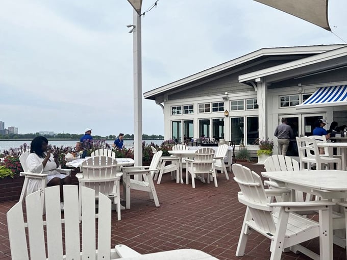 Harbor House's waterfront patio feels like you've snuck into someone's million-dollar backyard—except everyone's invited to this seafood party!