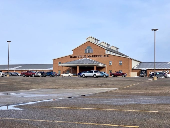 Hartville Marketplace stands proud against the Ohio sky—a cathedral of commerce where Amish craftsmanship meets modern bargain-hunting.