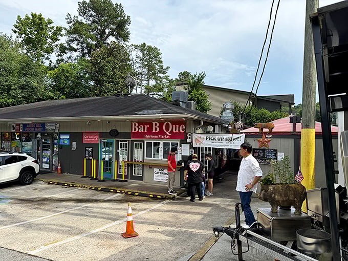 This unassuming storefront hides Atlanta's worst-kept barbecue secret. Small space, enormous flavors waiting behind that door.