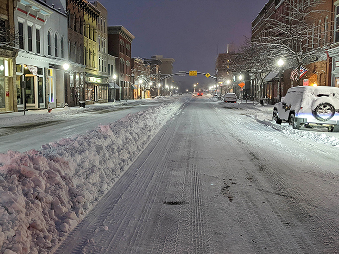 Winter's blanket transforms Main Street into a Currier and Ives masterpiece of twinkling lights and snow.