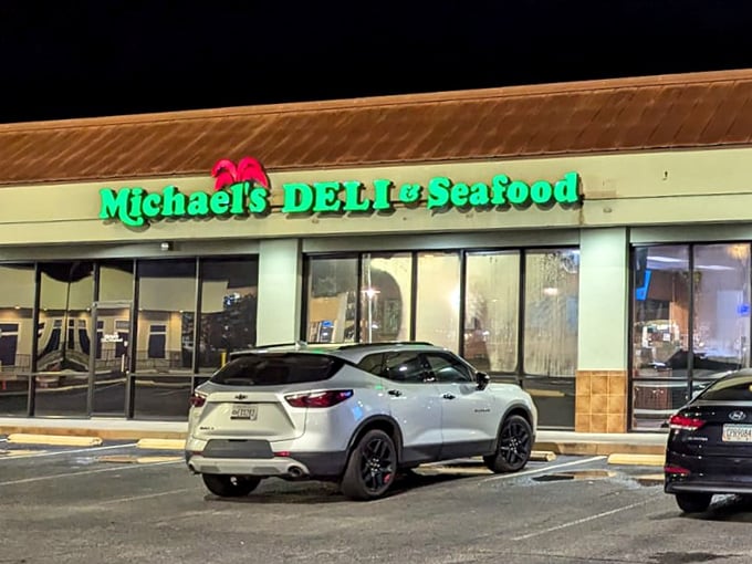Michael's neon sign glows like a beacon for night owls craving seafood and sandwiches. Midnight munchies, solved!