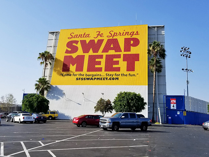 That yellow sign isn't just bright—it's a beacon of bargain hope! Santa Fe Springs Swap Meet promises treasures for those brave enough to explore.