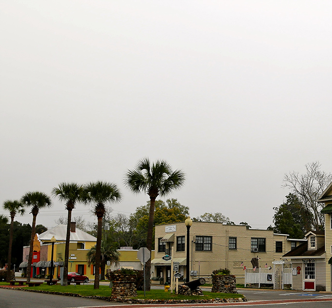 St. Marys' waterfront buildings stand ready to greet visitors, like colorful sentinels guarding the gateway to coastal adventures.