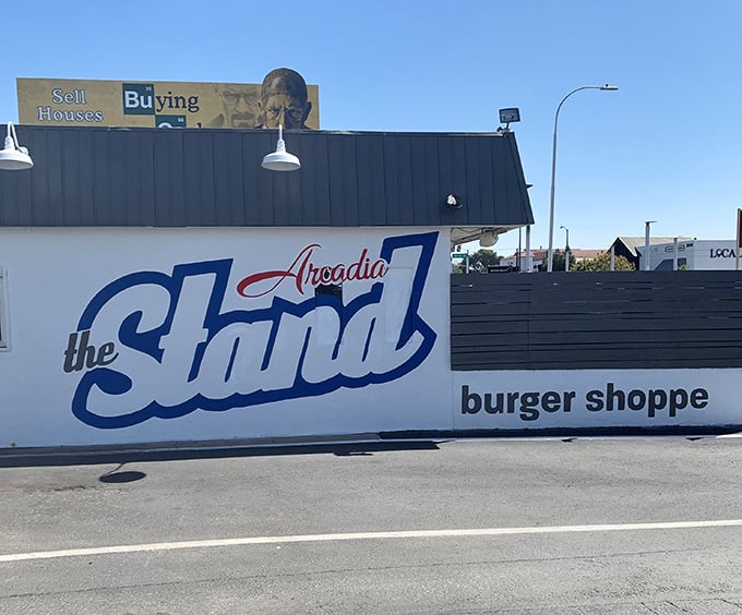 The Stand's bold blue signage stands out like a beacon for burger purists. Simplicity never looked—or tasted—so good.
