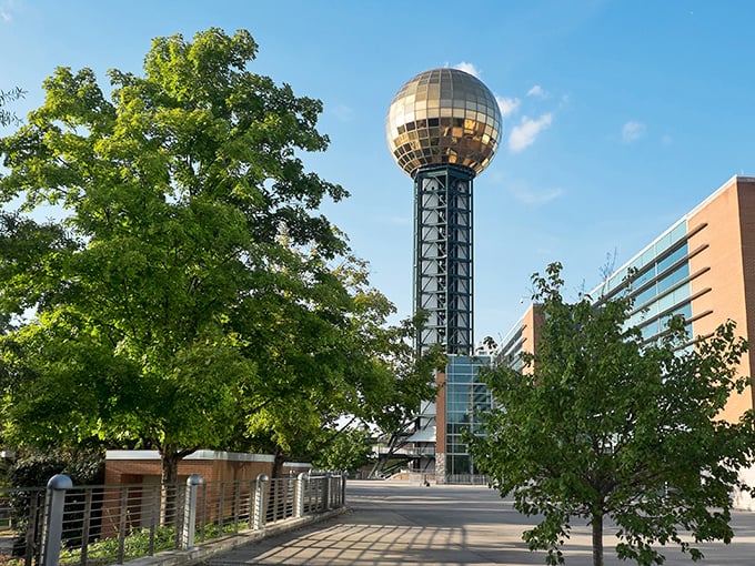 Knoxville's golden golf ball in the sky – it's like the Space Needle's flashier Southern cousin decided to dress for disco.