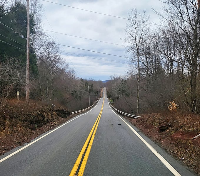 The kind of winding mountain road that makes your GPS nervous but your soul incredibly happy.