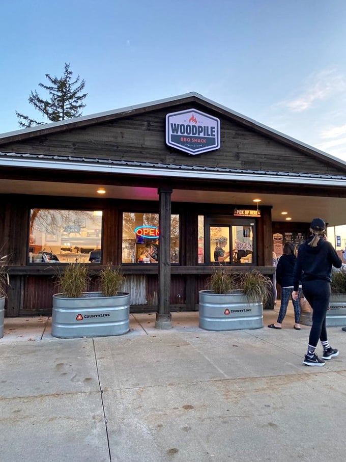 "Rustic charm meets serious smoking skills. That wooden exterior isn't just for show – it's advertising what happens to the meat inside!"