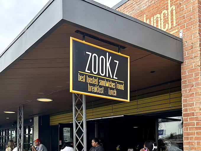 Zookz's distinctive sign promises "best toasted sandwiches 'round" – and they mean that literally! These perfectly circular creations are sandwich innovation at its finest.