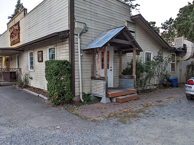 This unassuming side entrance to Back Porch Bar & Grill hides Jacksonville's worst-kept secret – BBQ worth crossing town for.