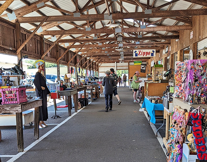 Weekend warriors navigate Barnyard Flea Market's aisles, where every table holds potential for discovery.
