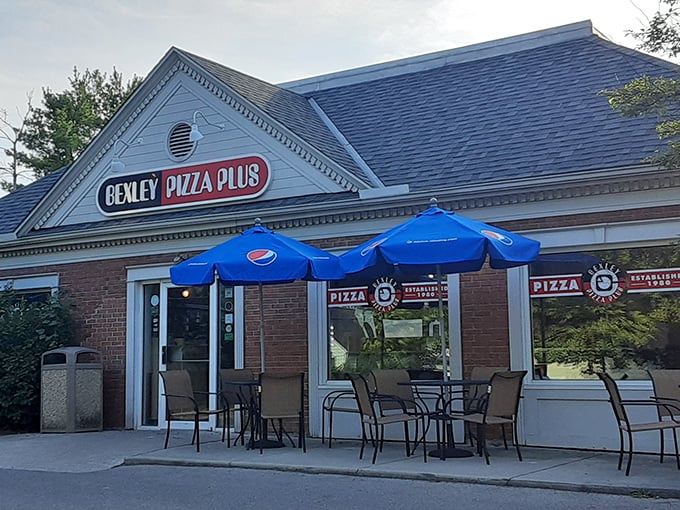 Bexley Pizza Plus: Those blue umbrellas offer shade for people waiting to taste pizza that's literally won national championships.
