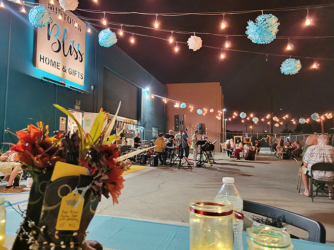Evening magic at Bliss Marketplace – string lights transform this thrift haven into an enchanted gathering space for treasure hunters and storytellers alike.