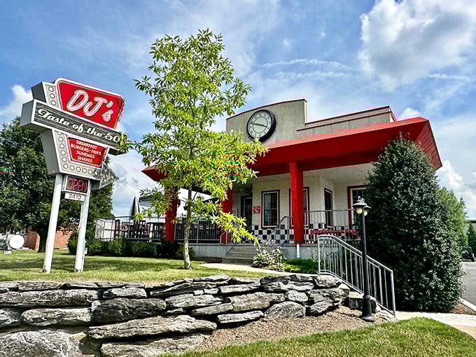 The checkerboard trim and vintage sign at DJ's – where even the building dresses for the decade it celebrates.