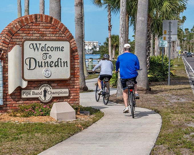 Dunedin welcomes visitors with Scottish pride and Florida sunshine. Those cyclists are headed toward adventure—and probably a good local brew.
