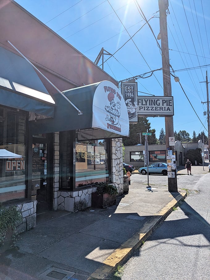 That stone facade has witnessed decades of pizza dreams coming true—and probably a few first dates that turned into marriages.