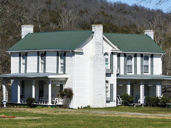 This stately Victorian home whispers stories of genteel living, surrounded by hills that cradle the town lovingly.