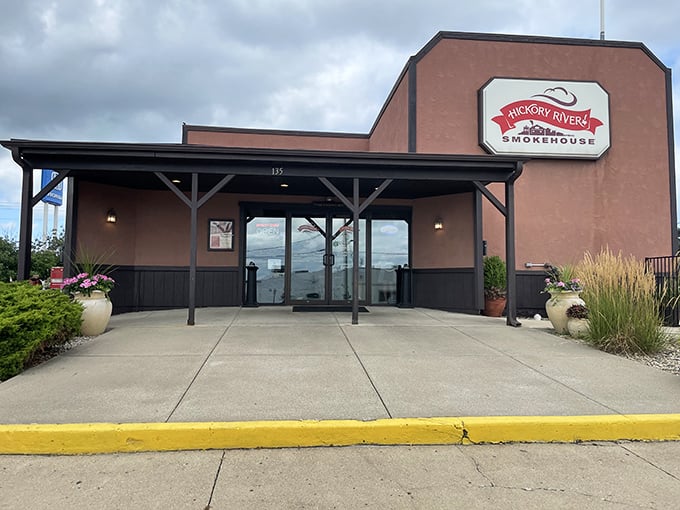 The entrance to Hickory River promises a journey into smoke-kissed territory – no passport required, just an appetite.