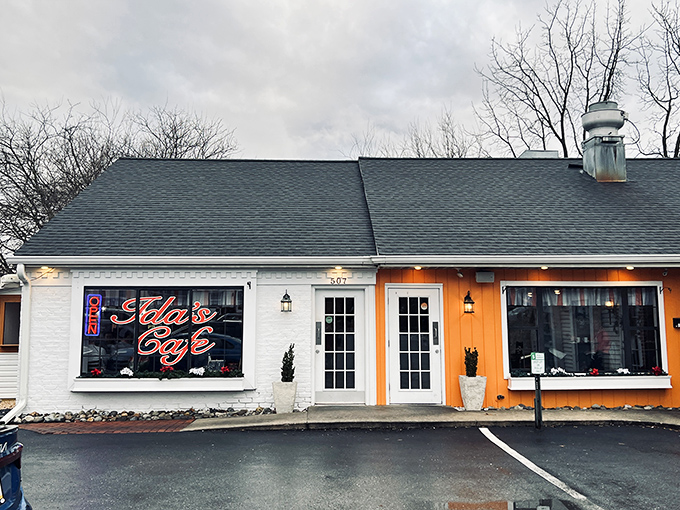 White brick, orange trim, and a glowing neon sign—Ida's has mastered the art of standing out while still feeling like the neighborhood's best-kept secret.