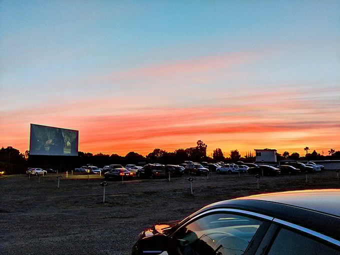 Blue skies fade to showtime at Madera 2. The massive screen awaits its transformation from blank canvas to cinematic magic.