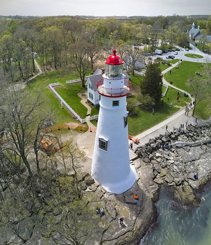 The historic Marblehead Lighthouse stands tall against Erie's horizon—a beacon that's guided generations safely home.