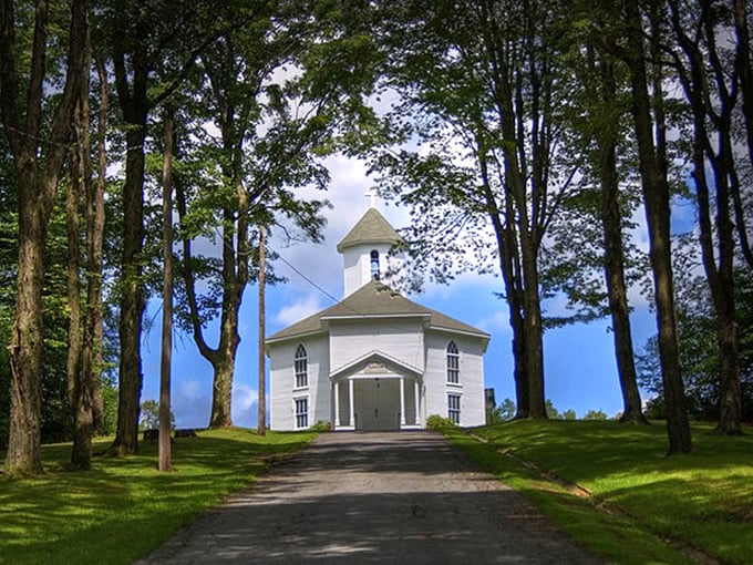 A quiet path leads to this peaceful white church, tucked among the trees and full of Mount Jewett’s timeless countryside charm.