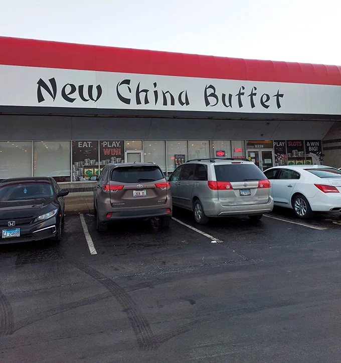 Parked cars tell the real story—locals know where to find authentic Chinese flavors without the fancy frills. Follow the crowd to good eating!