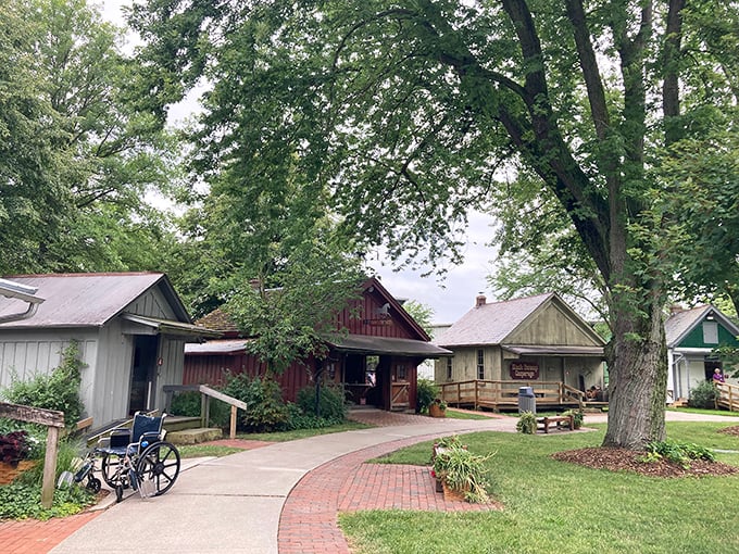 A winding brick path leads visitors through Sauder Village—where history isn't just displayed behind glass, it's alive and kicking!