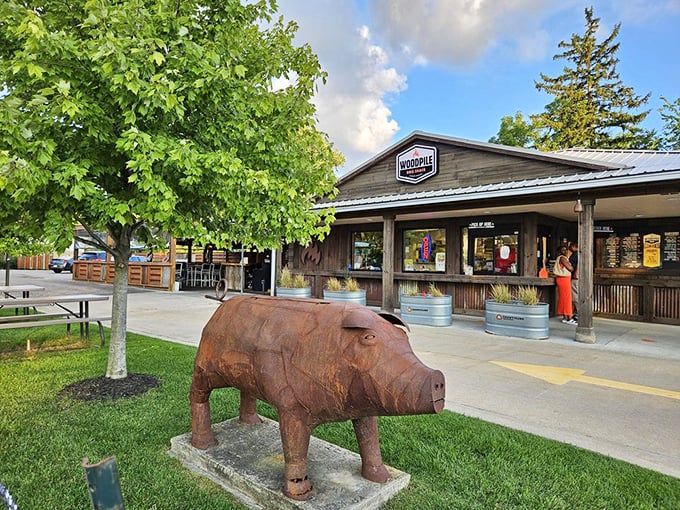 "That wooden pig statue isn't just cute decor – it's standing guard over some of Michigan's most tender, flavorful ribs."