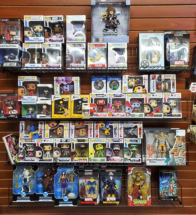 A collector's dream wall of pop culture royalty. These boxed figures aren't toys—they're investments with plastic smiles and impressive resale value.
