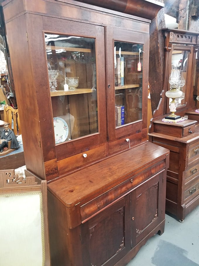 Imagine the stories this handsome cabinet could tell. With glass doors perfect for displaying your treasures (or hiding the good snacks from the grandkids).