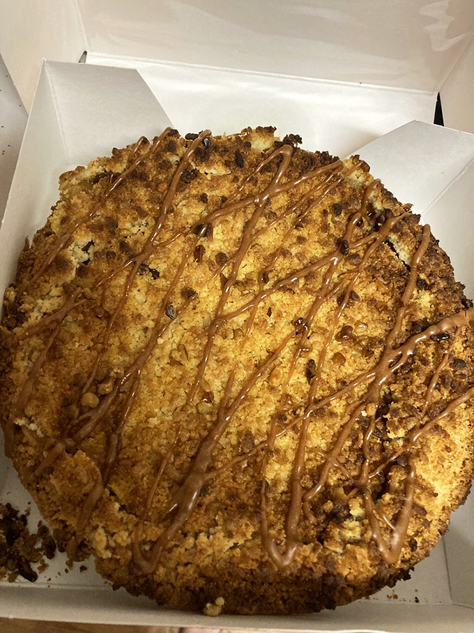 This apple caramel crumble isn't just a pie—it's architecture, with layers of buttery crumbs and caramel drizzle creating edible art.