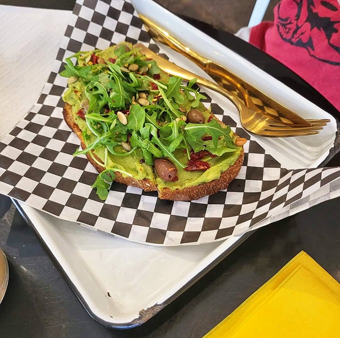Avocado toast that actually deserves its Instagram fame – a garden of microgreens and seeds atop that creamy green gold we'd all mortgage our futures for.