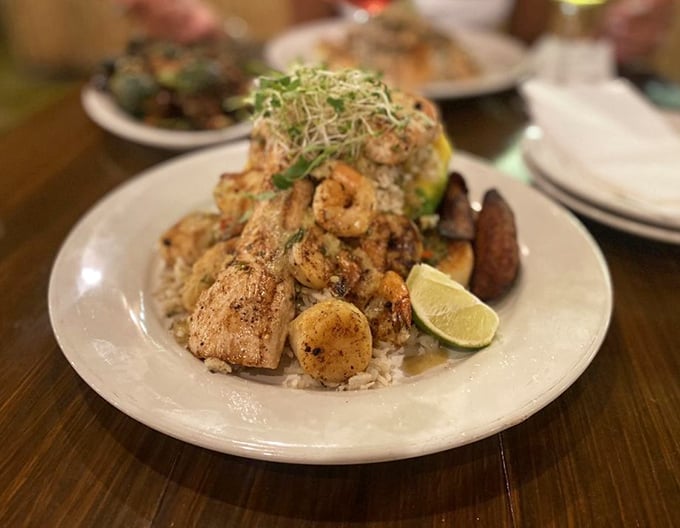 Seafood and rice that doesn't just speak to your stomach but writes it love poetry. The lime wedge isn't garnish—it's essential punctuation.