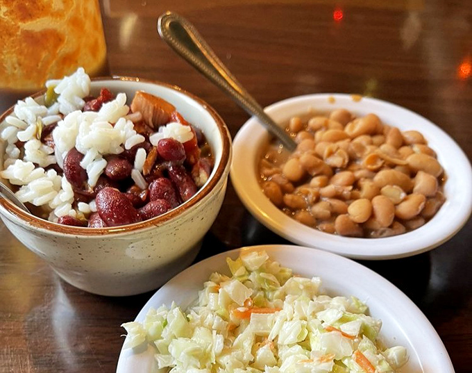 These aren't just any beans—they're slow-simmered BBQ beans with bits of pork that have been converting side dish skeptics for generations.