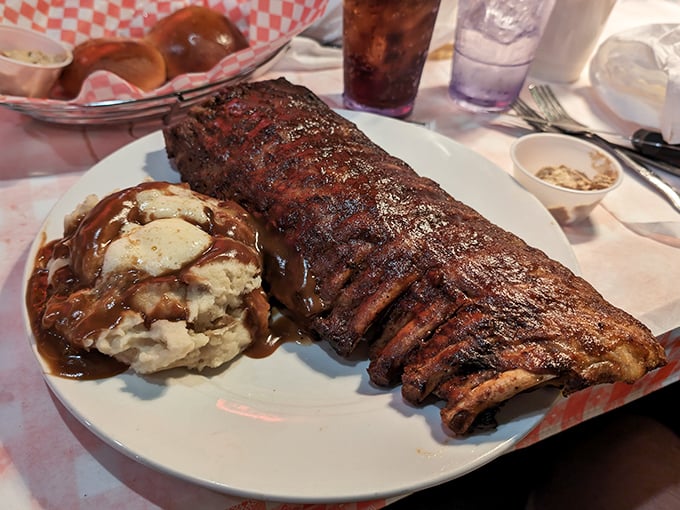 These ribs don't just fall off the bone—they practically jump onto your fork in a delicious surrender to gravity.