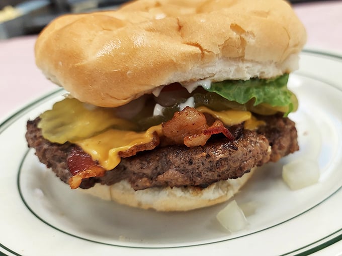 A burger that doesn't need a fancy name or truffle oil—just honest beef, melty cheese, and bacon that means business.