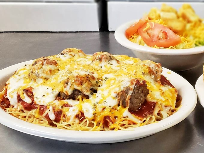 This isn't just baked spaghetti—it's a magnificent mountain of pasta, sauce, and melted cheese that would make any Italian grandmother nod in approval.