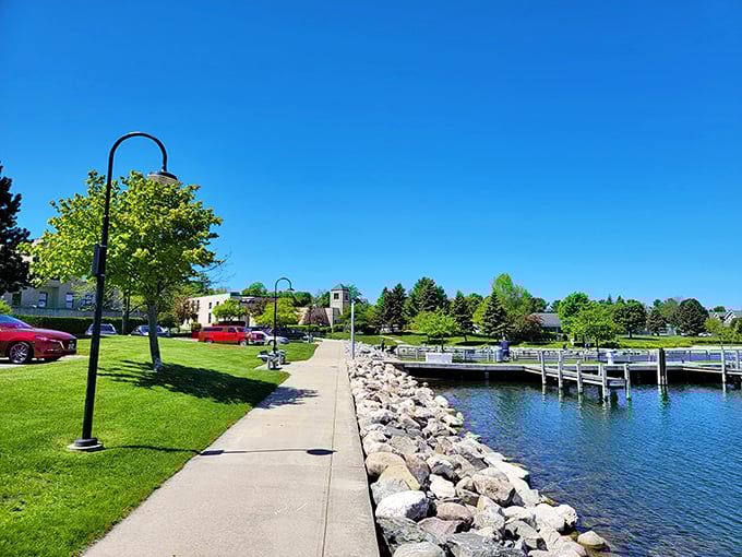 Bayfront Park's waterside walkway proves that the best amenities in retirement aren't fancy—they're free views that million-dollar condos elsewhere charge for.
