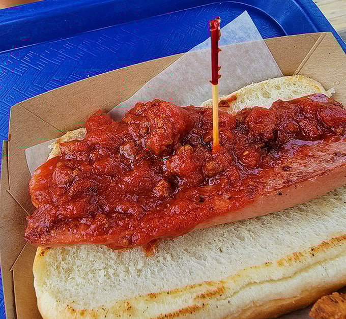 This isn't just a chili dog—it's a masterclass in comfort food engineering. The kind of messy perfection worth ruining a shirt for.