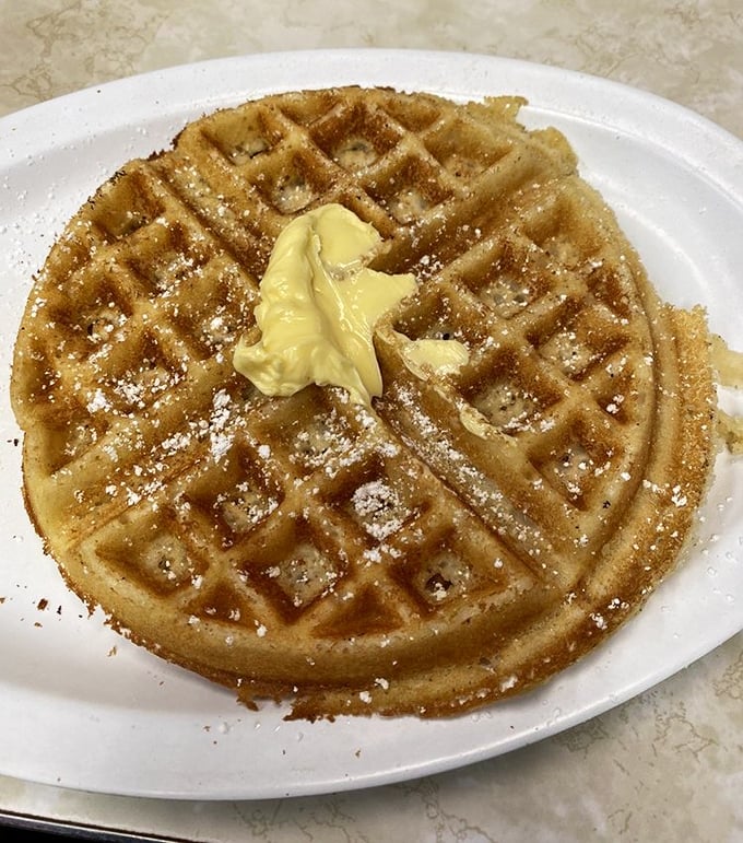 This golden Belgian waffle doesn't need a passport—it's traveled through time instead, bringing butter-melting perfection to your morning.