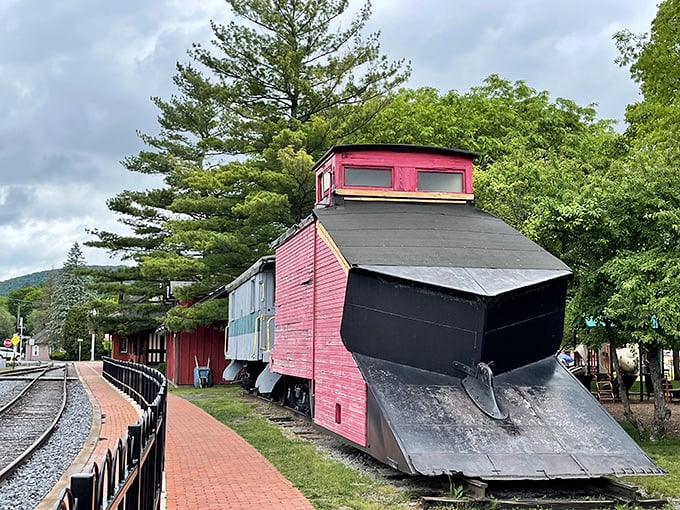 The vintage snowplow at Bellefonte's railroad display proves that even practical objects can become charming with enough history behind them.