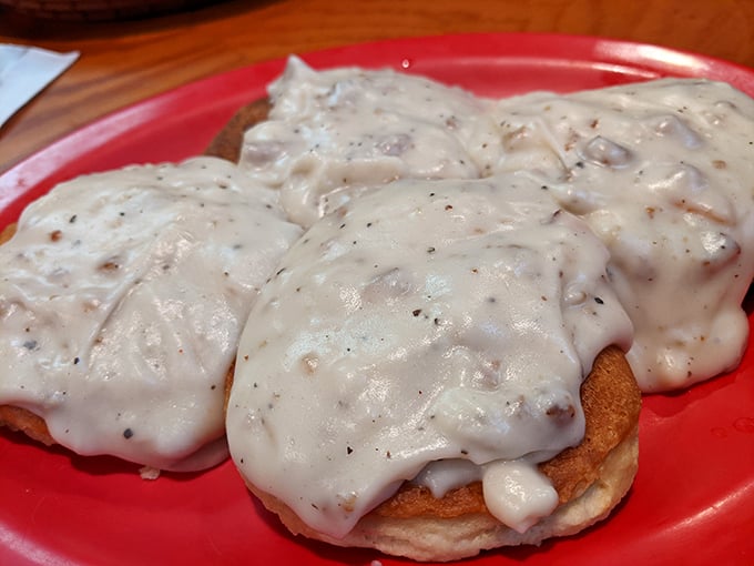 These biscuits and gravy aren't just a meal, they're a southern heirloom – creamy, peppery gravy cascading over fresh-baked pillows of comfort. 